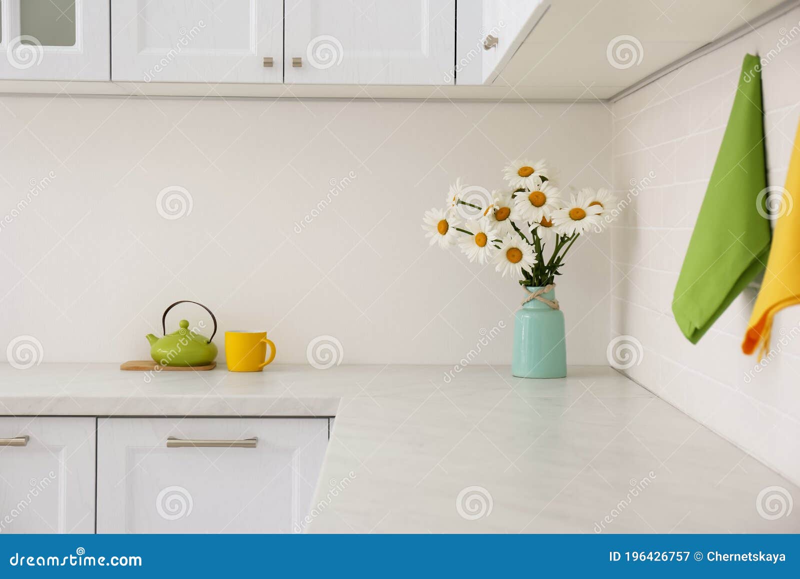 Beautiful Bouquet and Tea Set on Counter in Kitchen. Interior Design ...