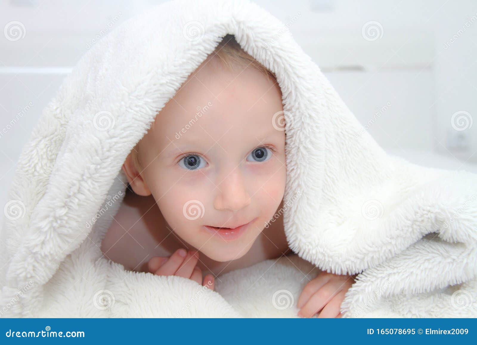 Beautiful Boy Looking Out from Under Blanket Stock Image - Image of ...