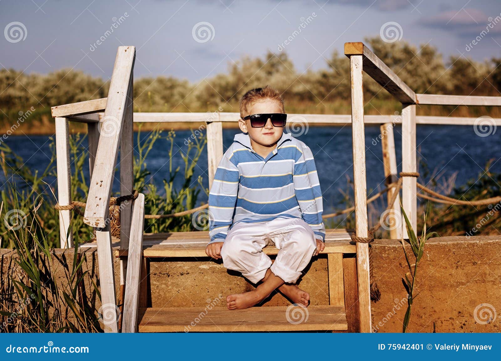 Beautiful Boy Posing on a Wooden Bridge Stock Image - Image of ...