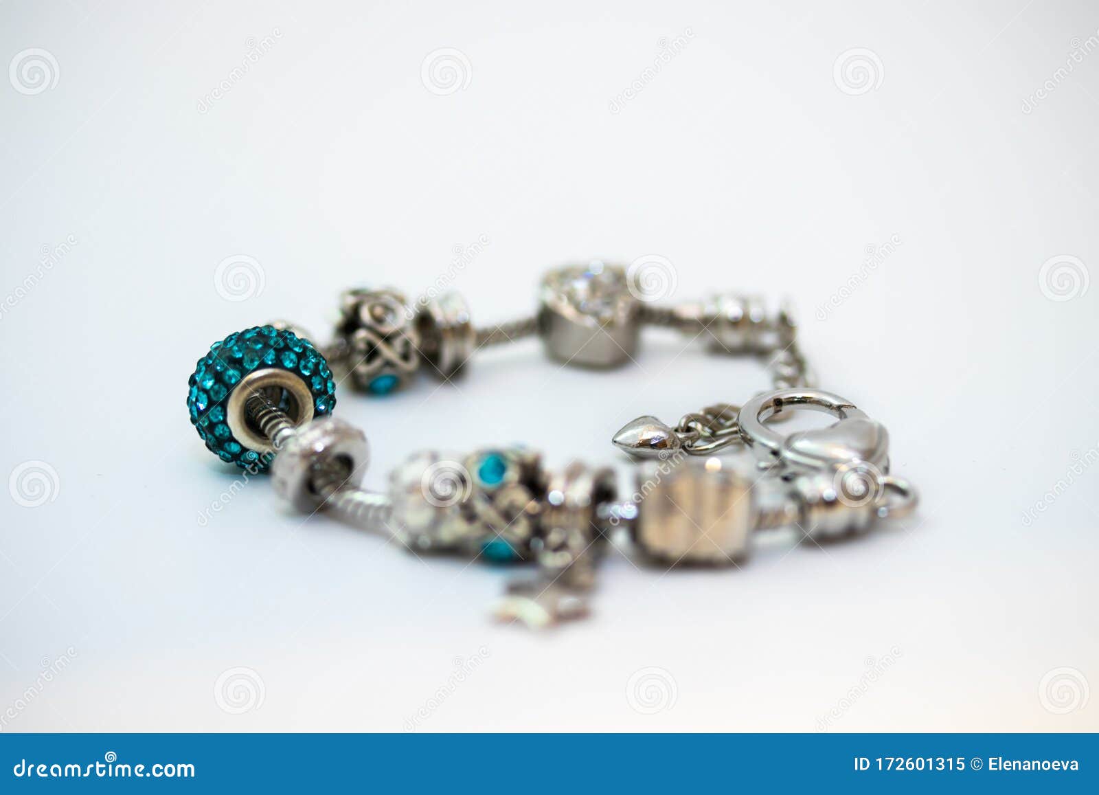 Beautiful Bracelet with Charms on White Background Stock Image - Image ...