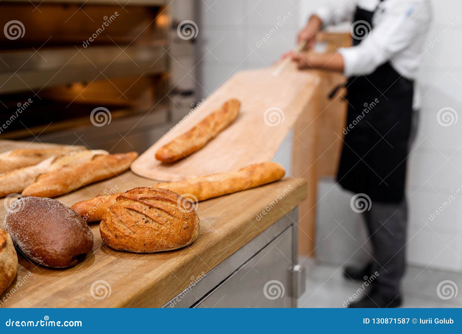 Beautiful Bread Loaves on Table Stock Image - Image of peel, dining ...