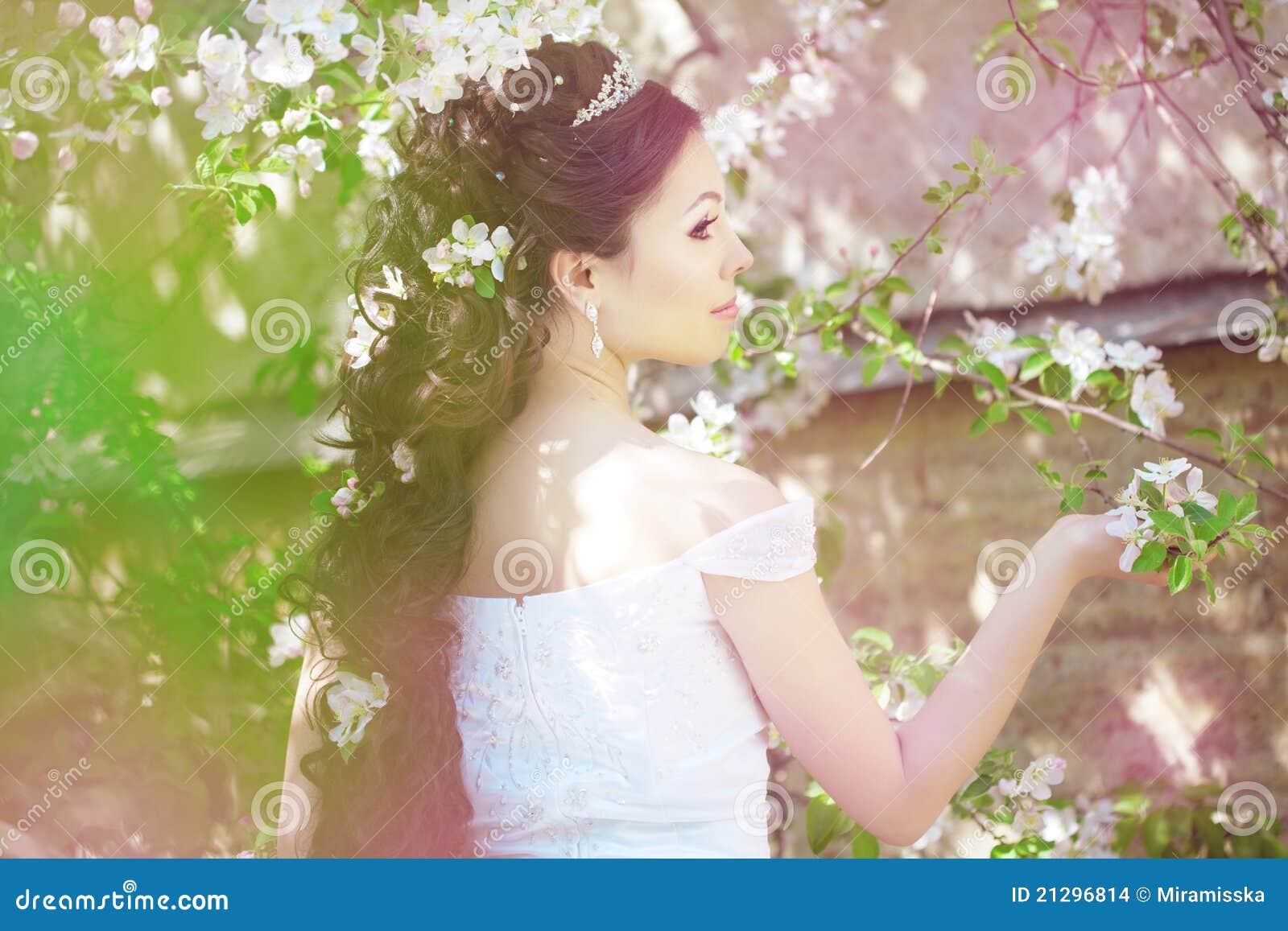 Beautiful Bride in a Blossoming Garden Stock Photo - Image of flowers ...
