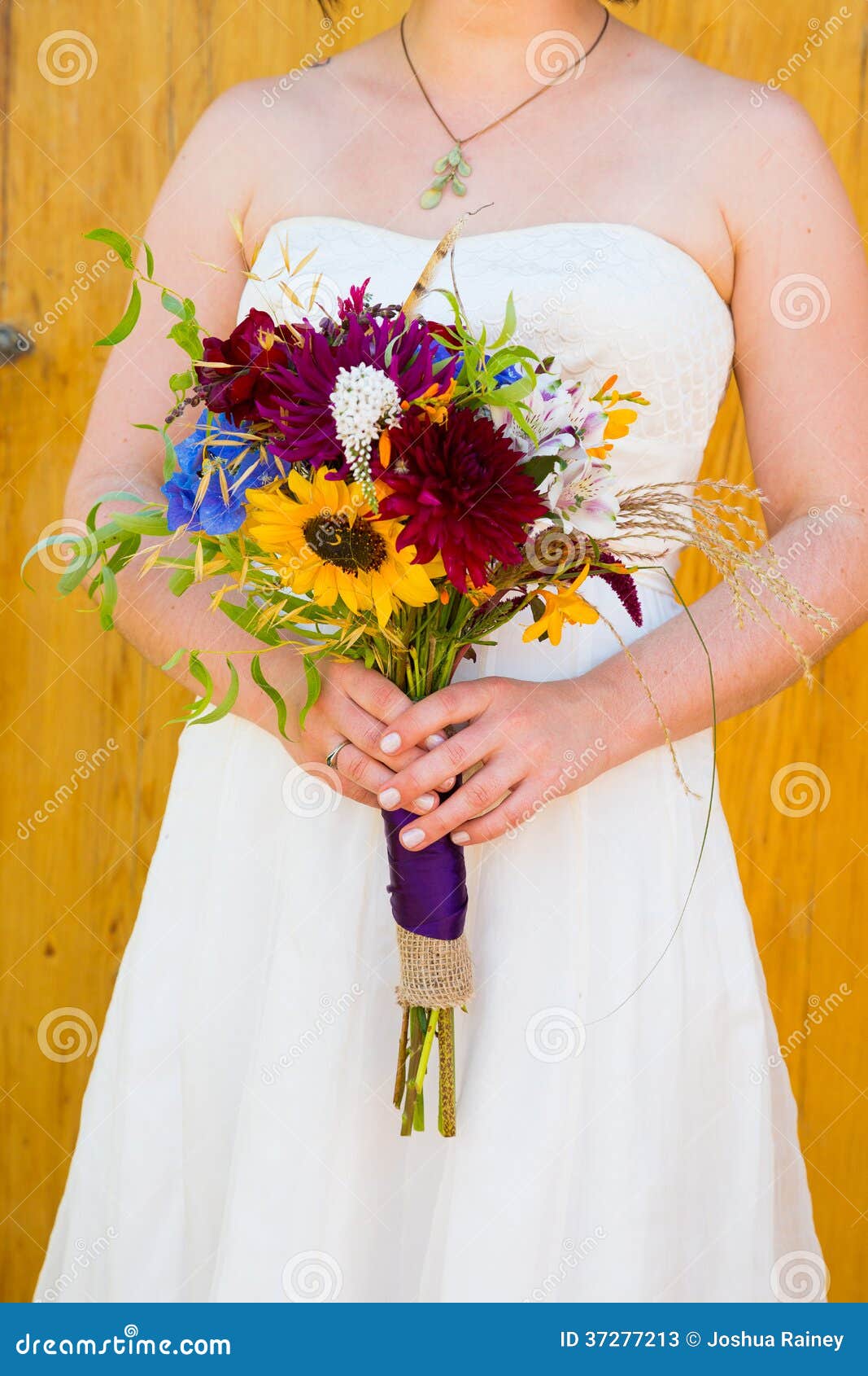 Beautiful Bride Holding Flowers Stock Image - Image of portraits, mixed ...
