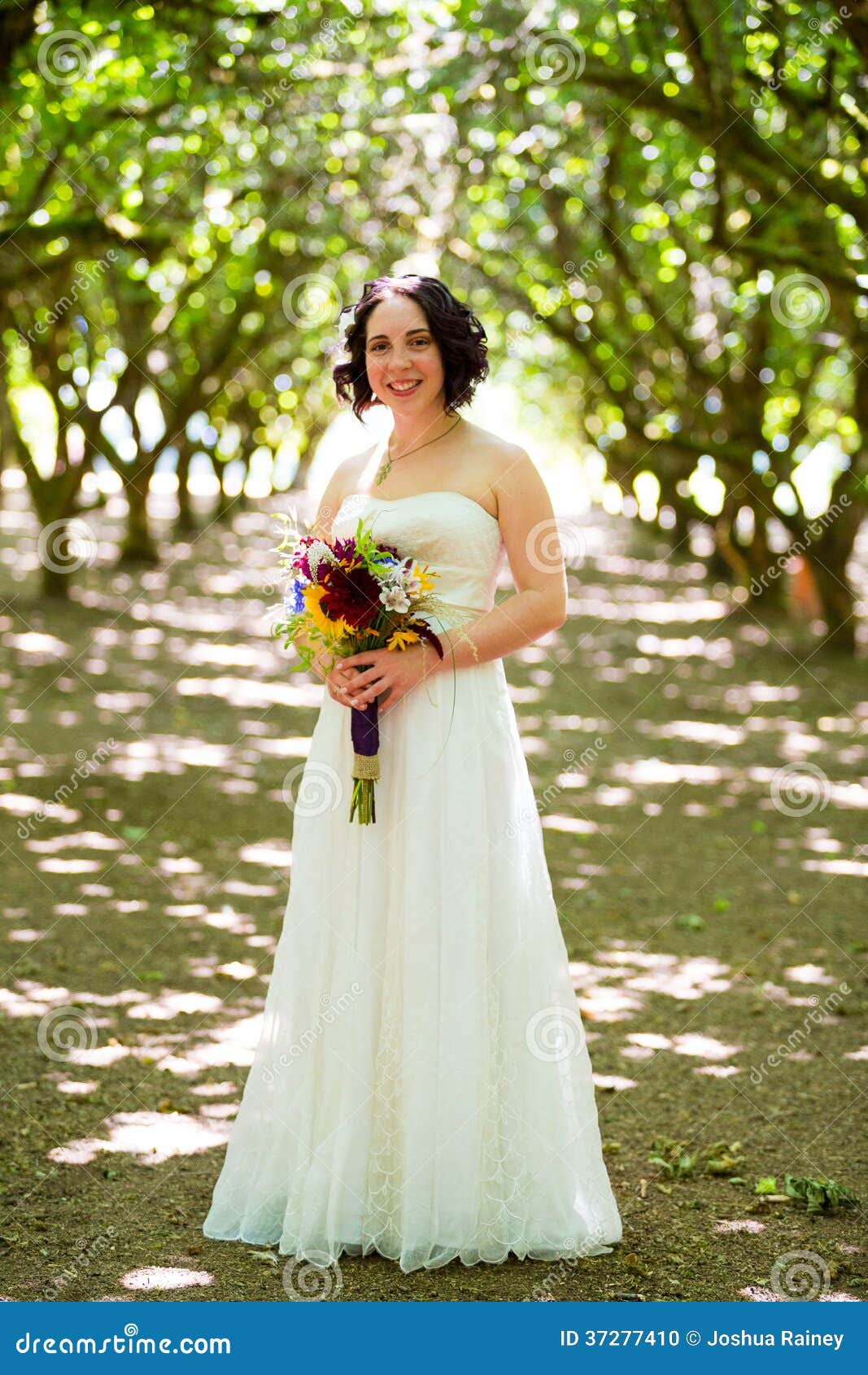 Beautiful Bride Holding Flowers Stock Photo - Image of mixed, girl ...