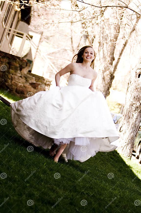 Beautiful Bride Running stock image. Image of dress, crouched - 2606215