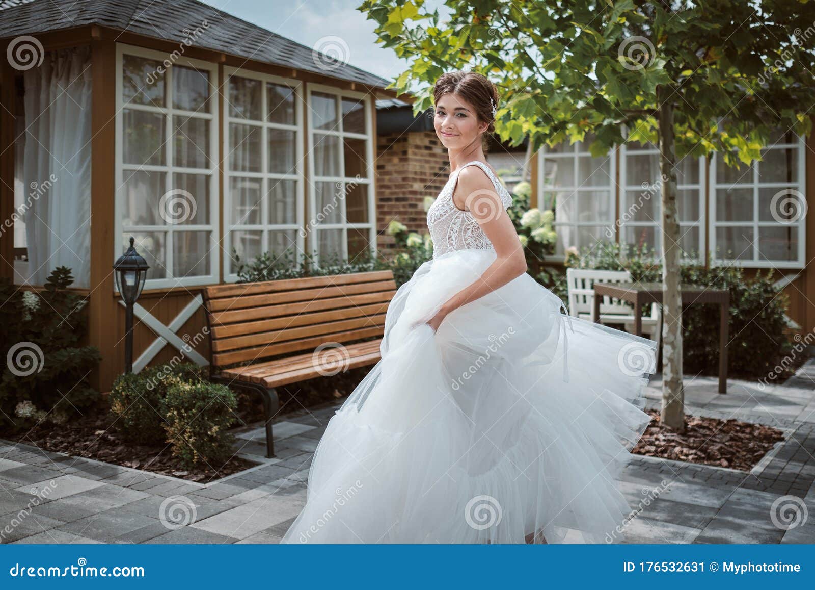 Beautiful Bride Running Away in the Garden Stock Image - Image of ...