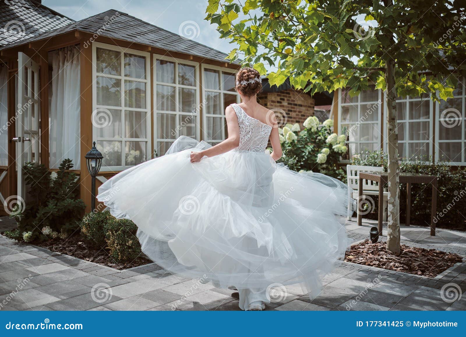 Beautiful Bride Running Away in the Garden Stock Image - Image of ...