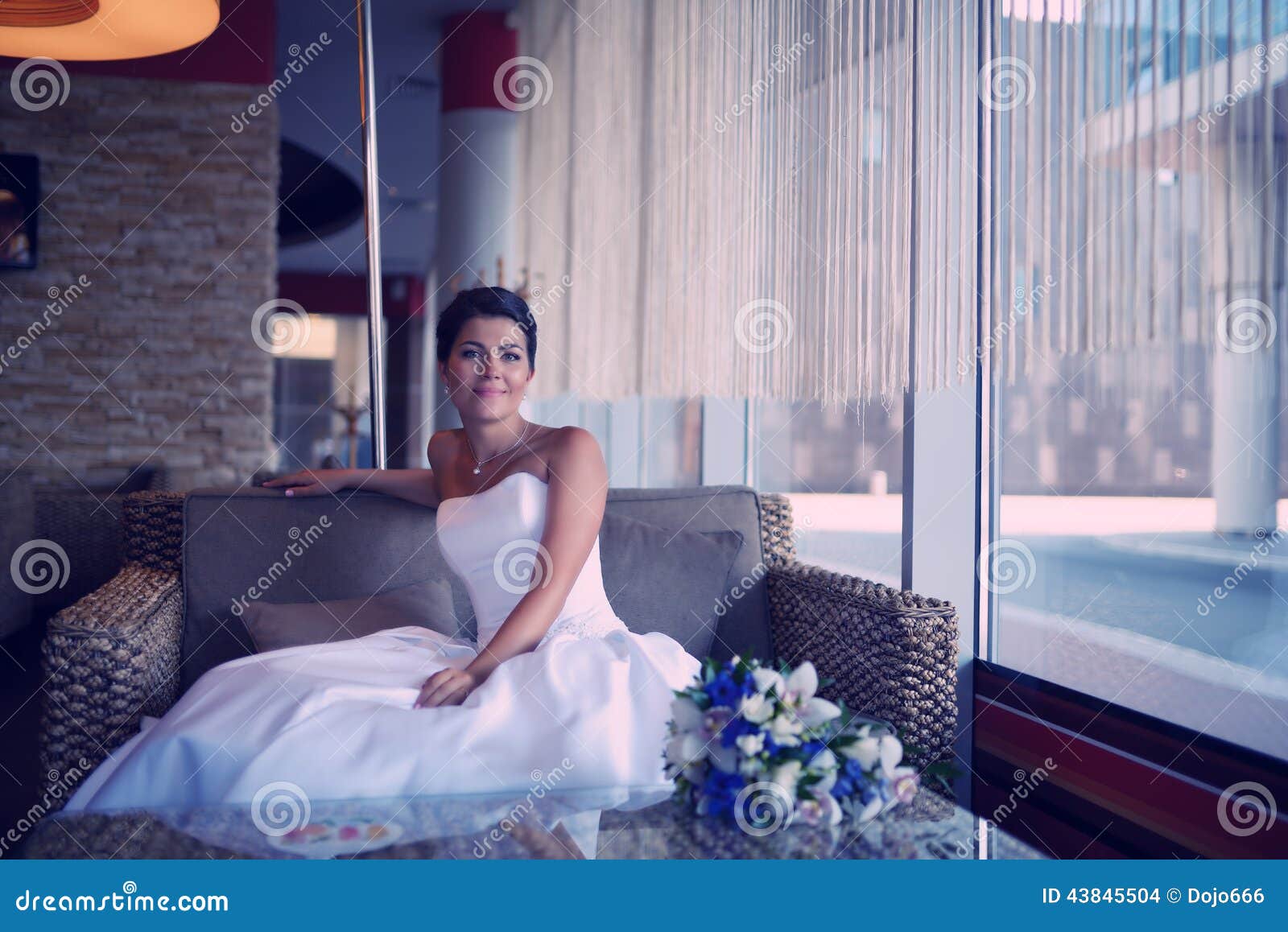 Beautiful Bride Sitting at an Indoor Cafe Stock Photo - Image of ...