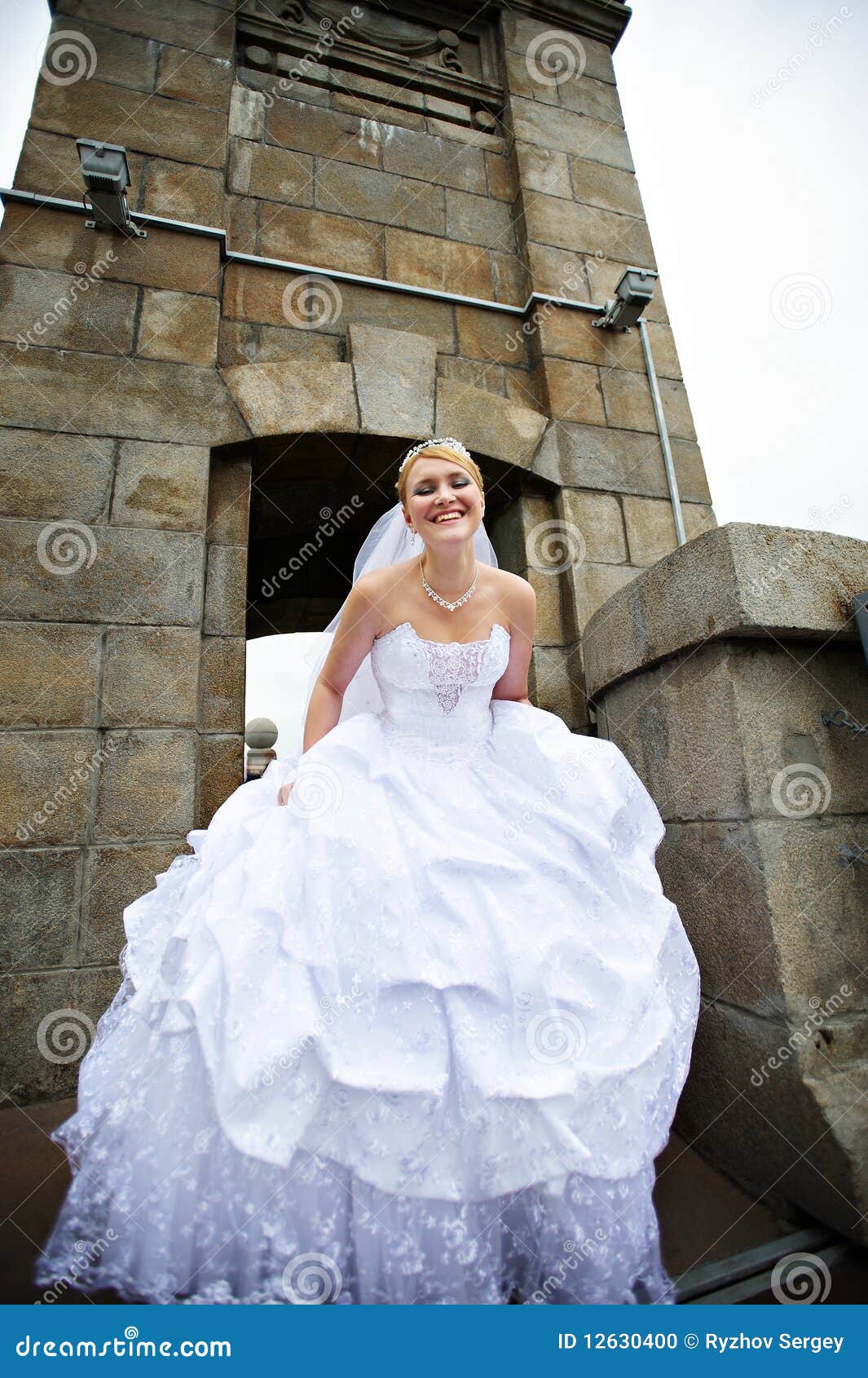 Beautiful Bride in a Wedding Dress on Bridge Stock Photo - Image of ...