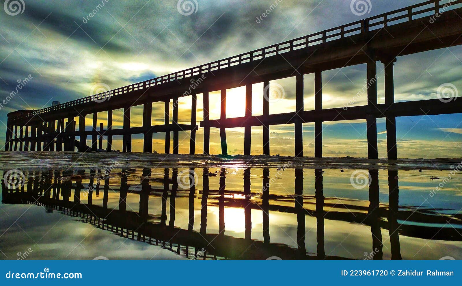 Beautiful Bridge in Sea Beach with Beautiful Sunset Stock Photo - Image ...