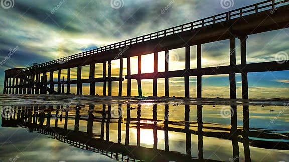 Beautiful Bridge in Sea Beach with Beautiful Sunset Stock Photo - Image ...