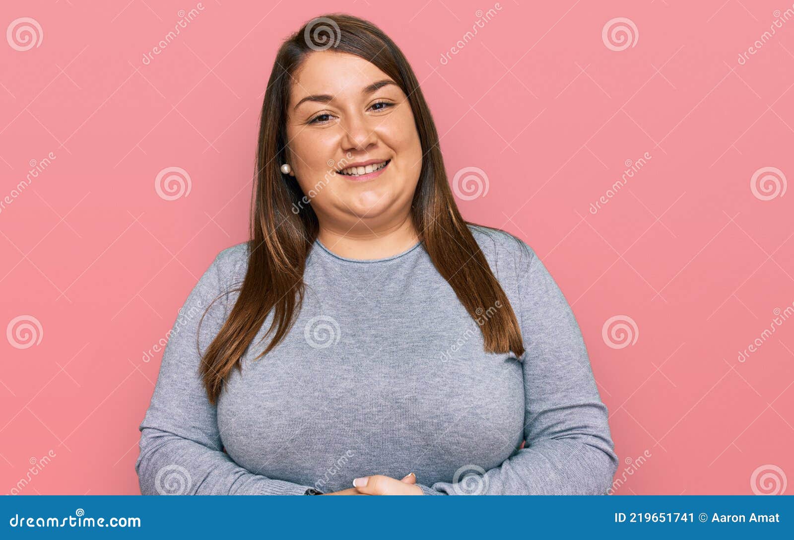 Beautiful Brunette Plus Size Woman Wearing Casual Clothes With Hands