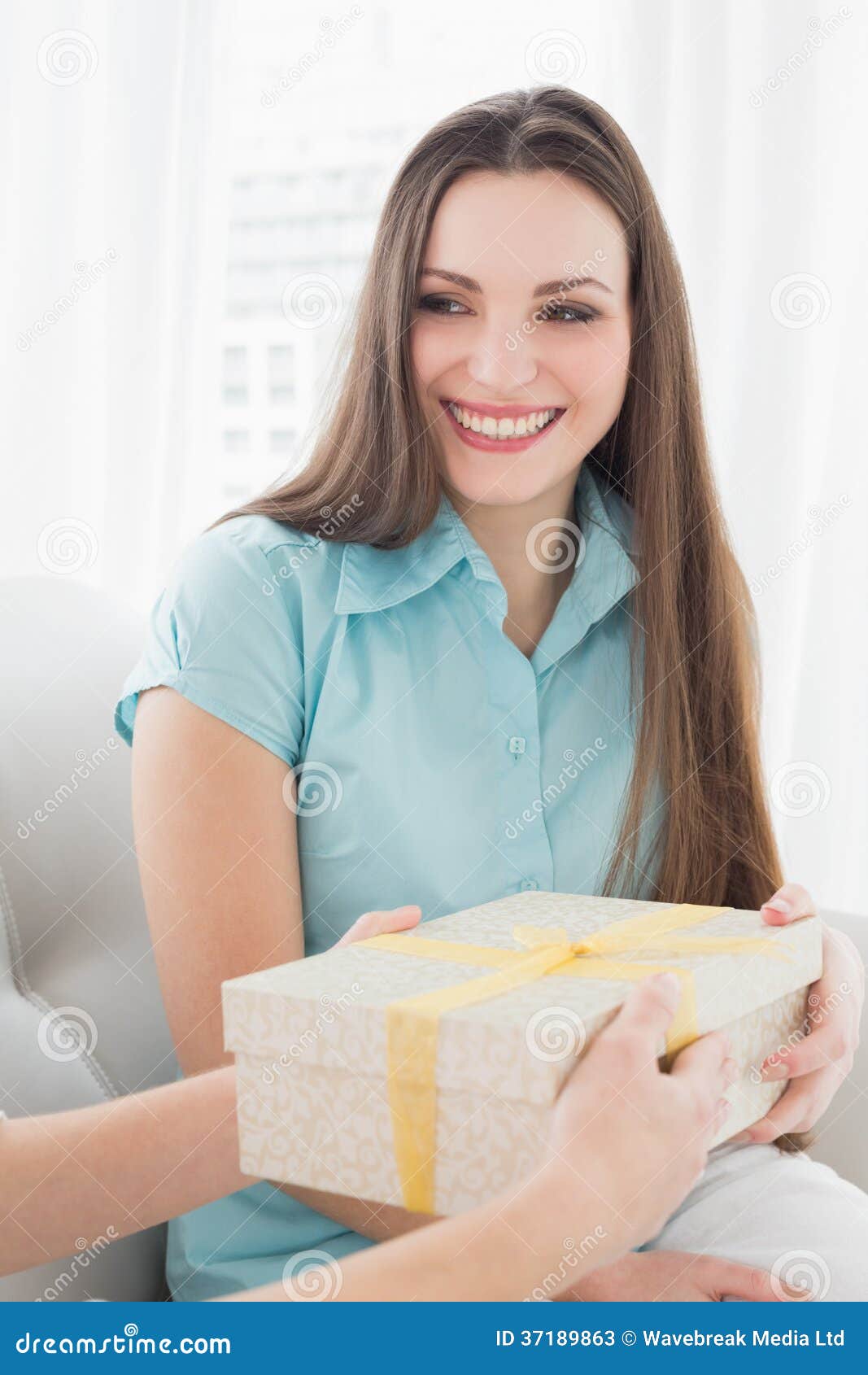 Beautiful Brunette Receiving a Gift Box at Home Stock Image - Image of ...