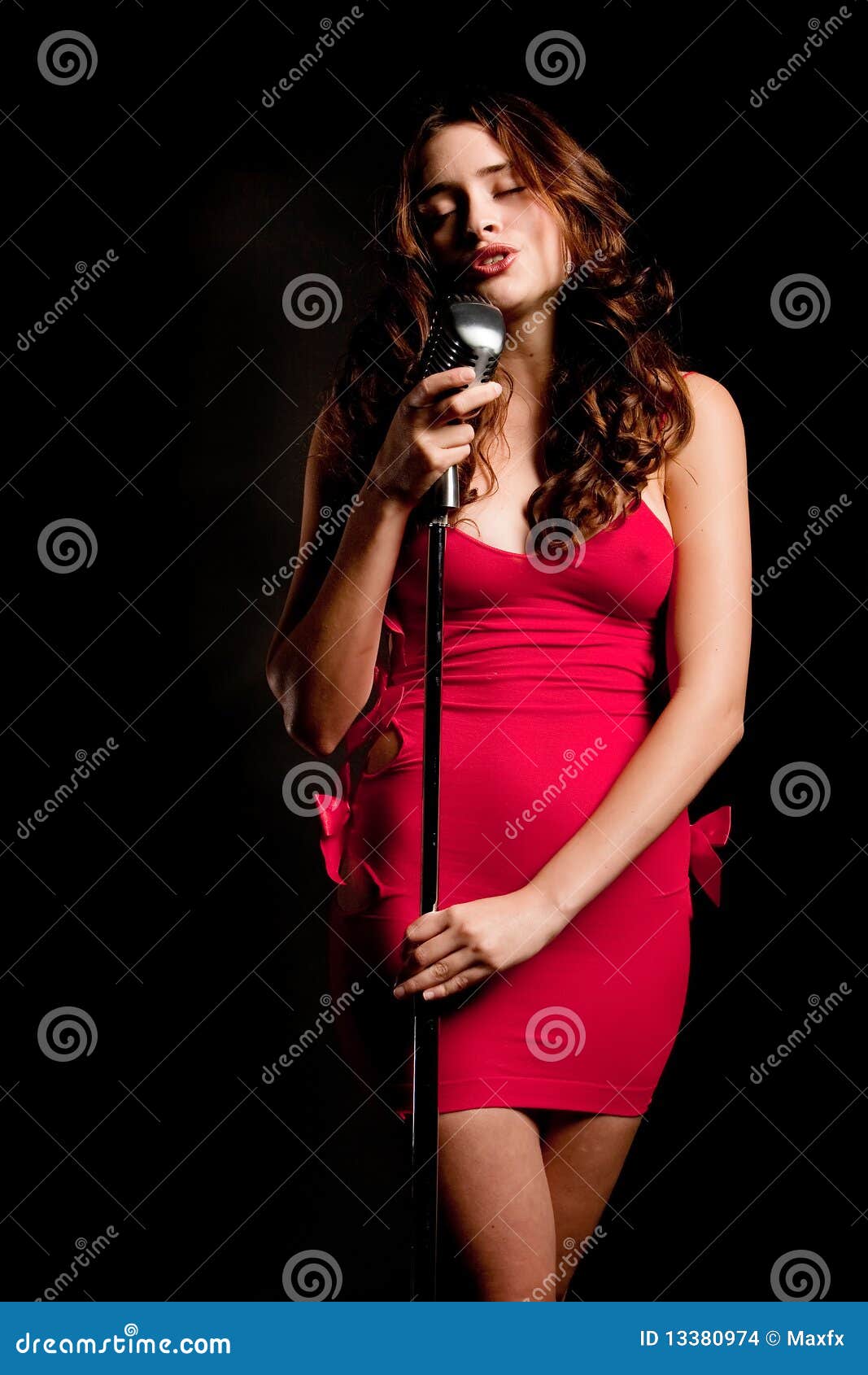 Beautiful Brunette Singer Singing with Microphone Stock Photo - Image ...