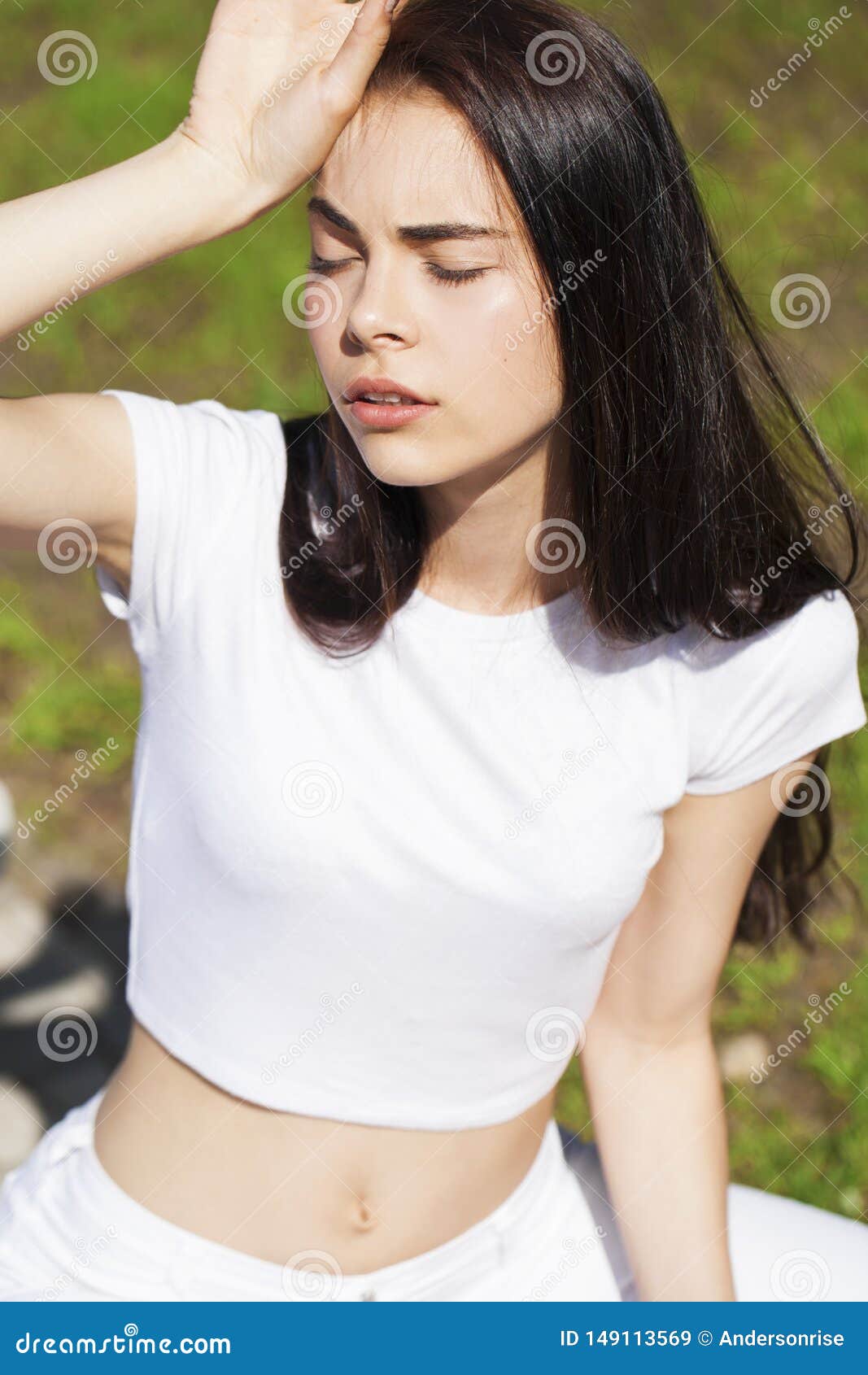 Beautiful Brunette Woman Posing Against Summer Park Bright Sunny