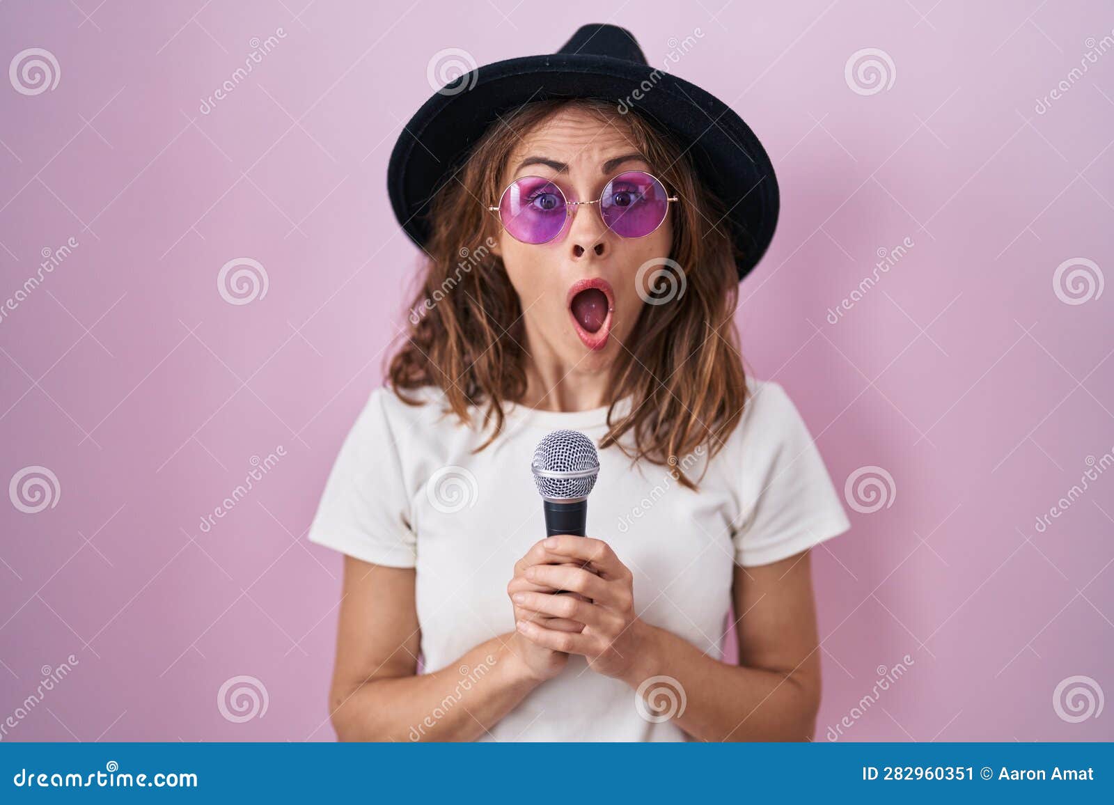 Beautiful Brunette Woman Singing Song Using Microphone Afraid And