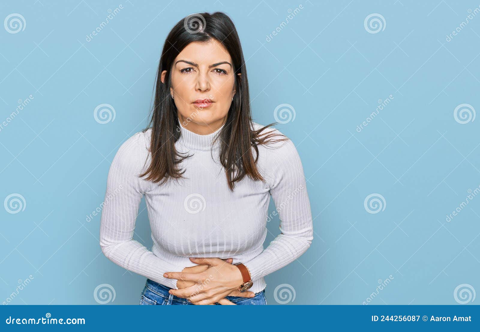 Beautiful Brunette Woman Wearing Casual Clothes With Hand On Stomach
