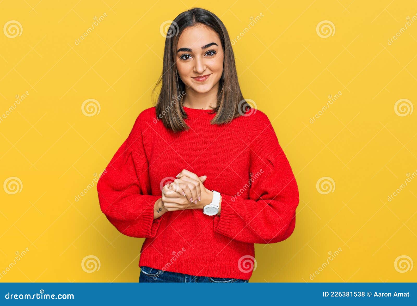 Beautiful Brunette Woman Wearing Casual Winter Sweater With Hands