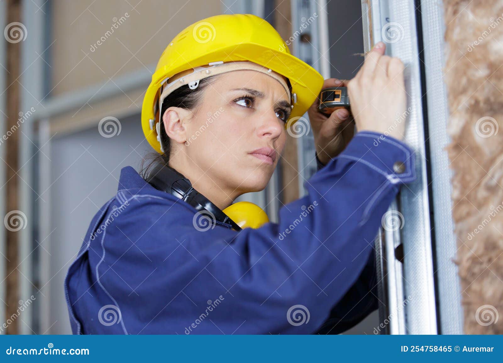Beautiful Builder with Measuring Tape in New Apartment Stock Image ...