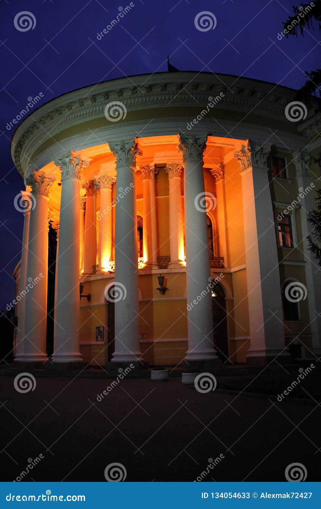 Beautiful Building with White Columns Illuminated by Lights at ...