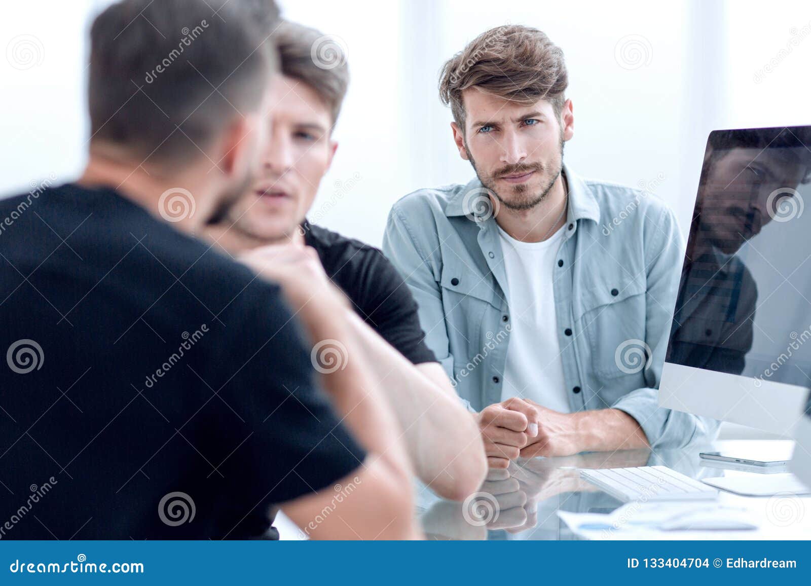 Beautiful Business People are Using Computers while Working in O Stock ...