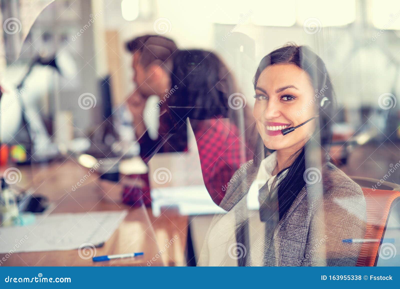 Beautiful Call Center Agent Browsing the Internet on Her Computer Stock ...