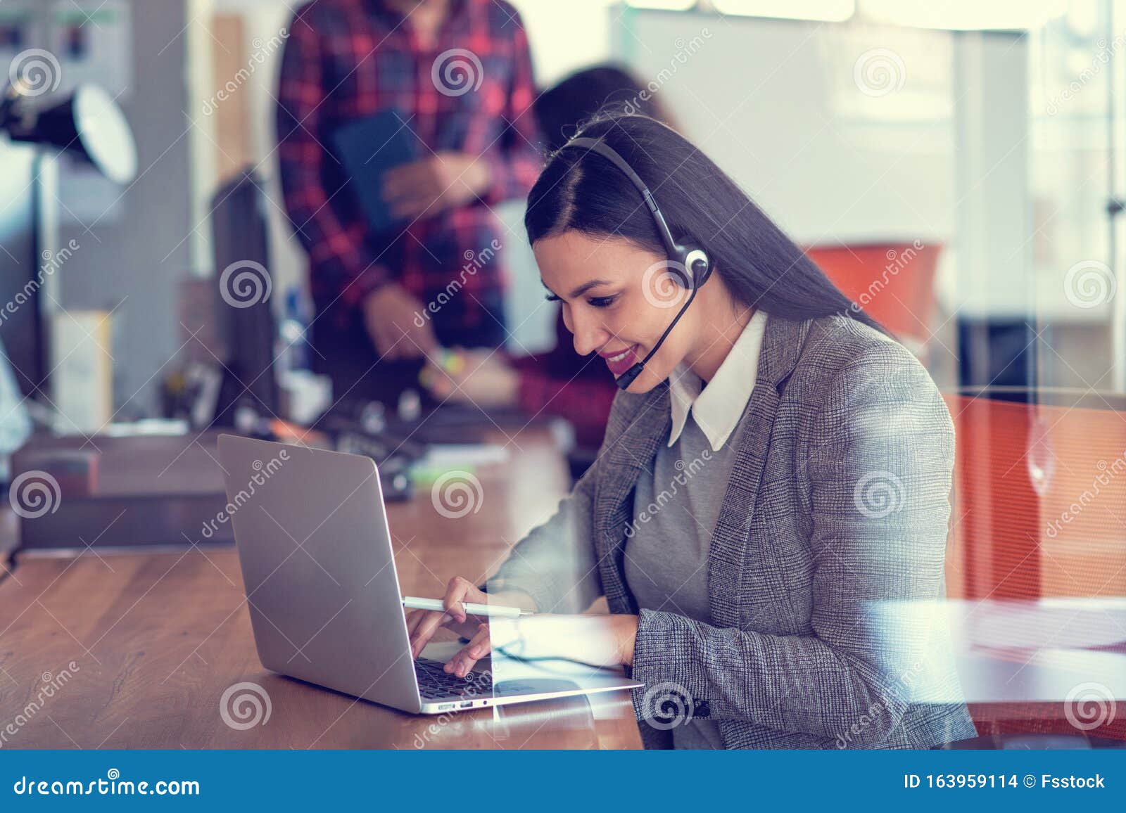 Beautiful Call Center Agent Browsing the Internet on Her Computer Stock ...