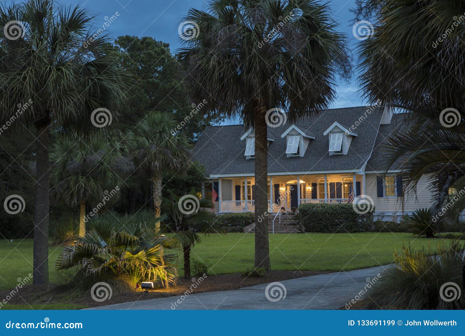 Beautiful Cape Cod House Lit Up at Twilight Stock Image - Image of ...