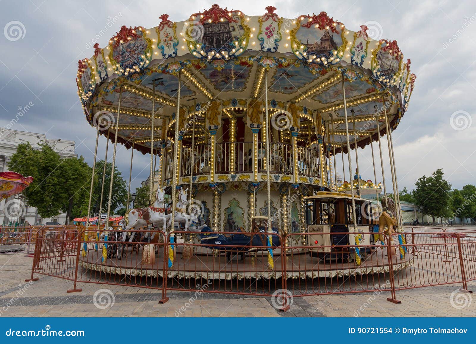 Beautiful Carousel On Background Of Large Ship. Action. Bright Carousel ...