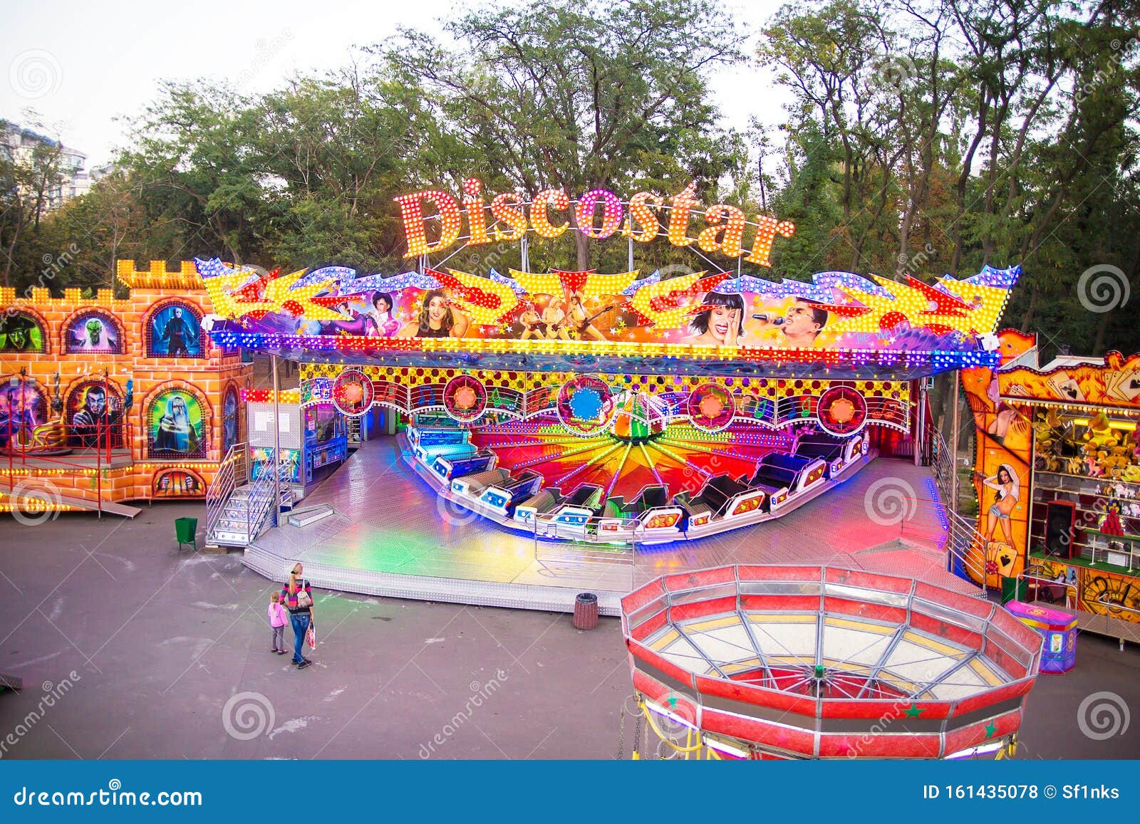 Beautiful Carousel Lights in Different Lights. Summer Joy Editorial ...