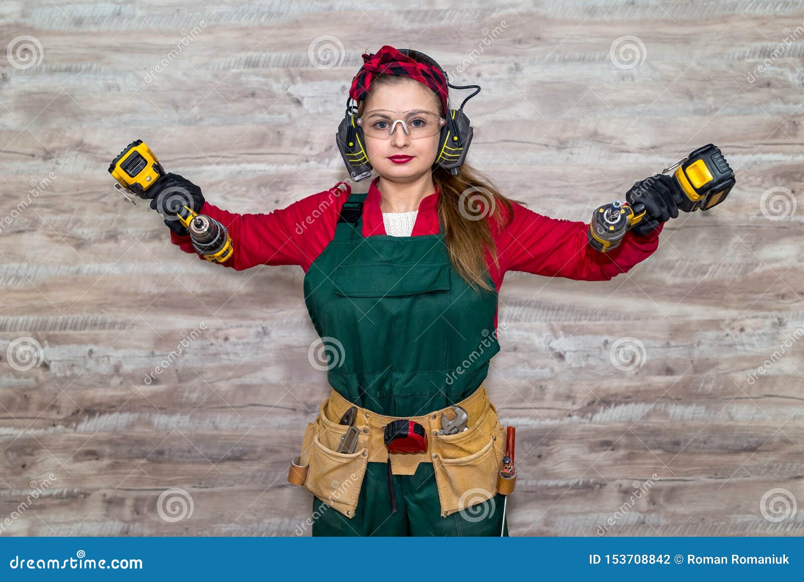 Beautiful Carpenter Posing with Drill Machines on Wooden Background ...