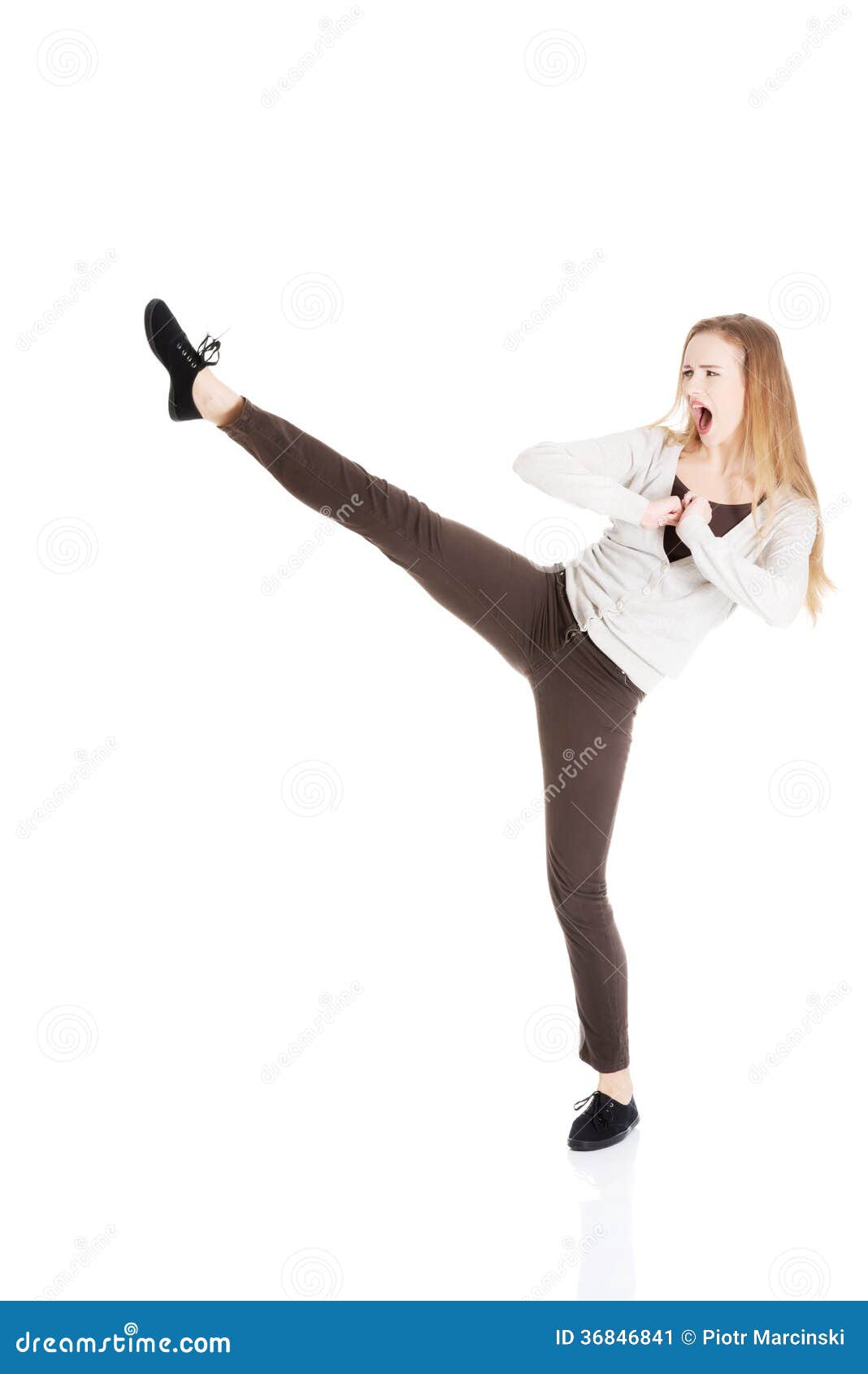 Beautiful Casual Woman Doing a Kick. Stock Image - Image of exercise ...