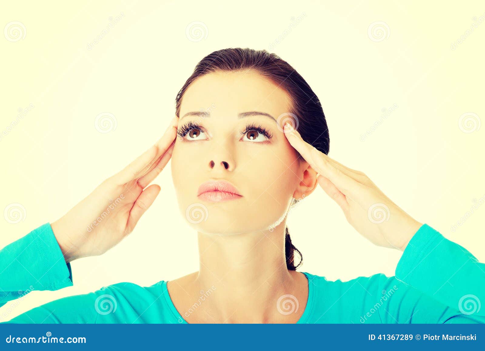 Beautiful Casual Woman Touching Her Temples. Stock Image - Image of ...
