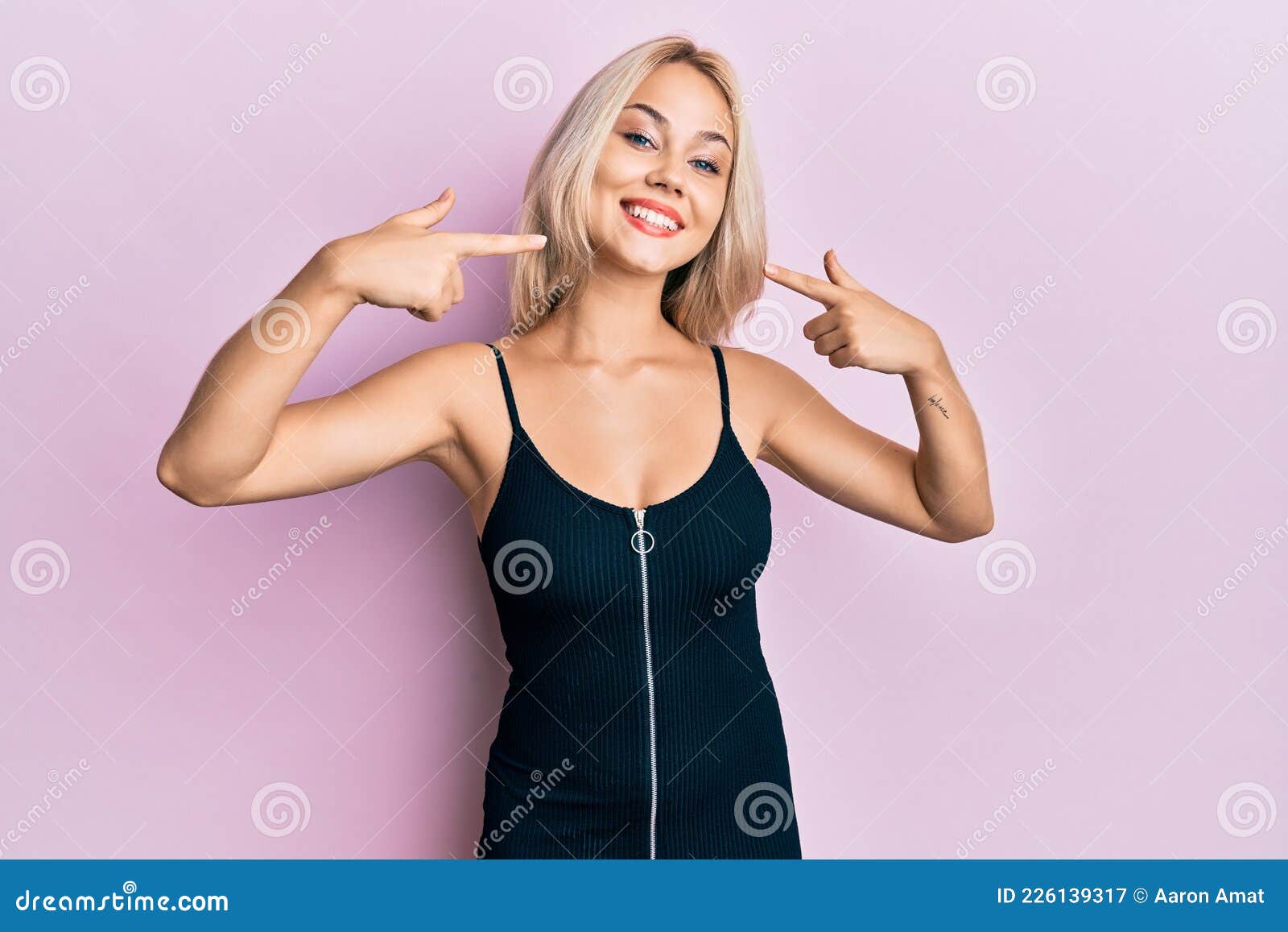 Beautiful Caucasian Blonde Girl Wearing Party Dress Smiling Cheerful