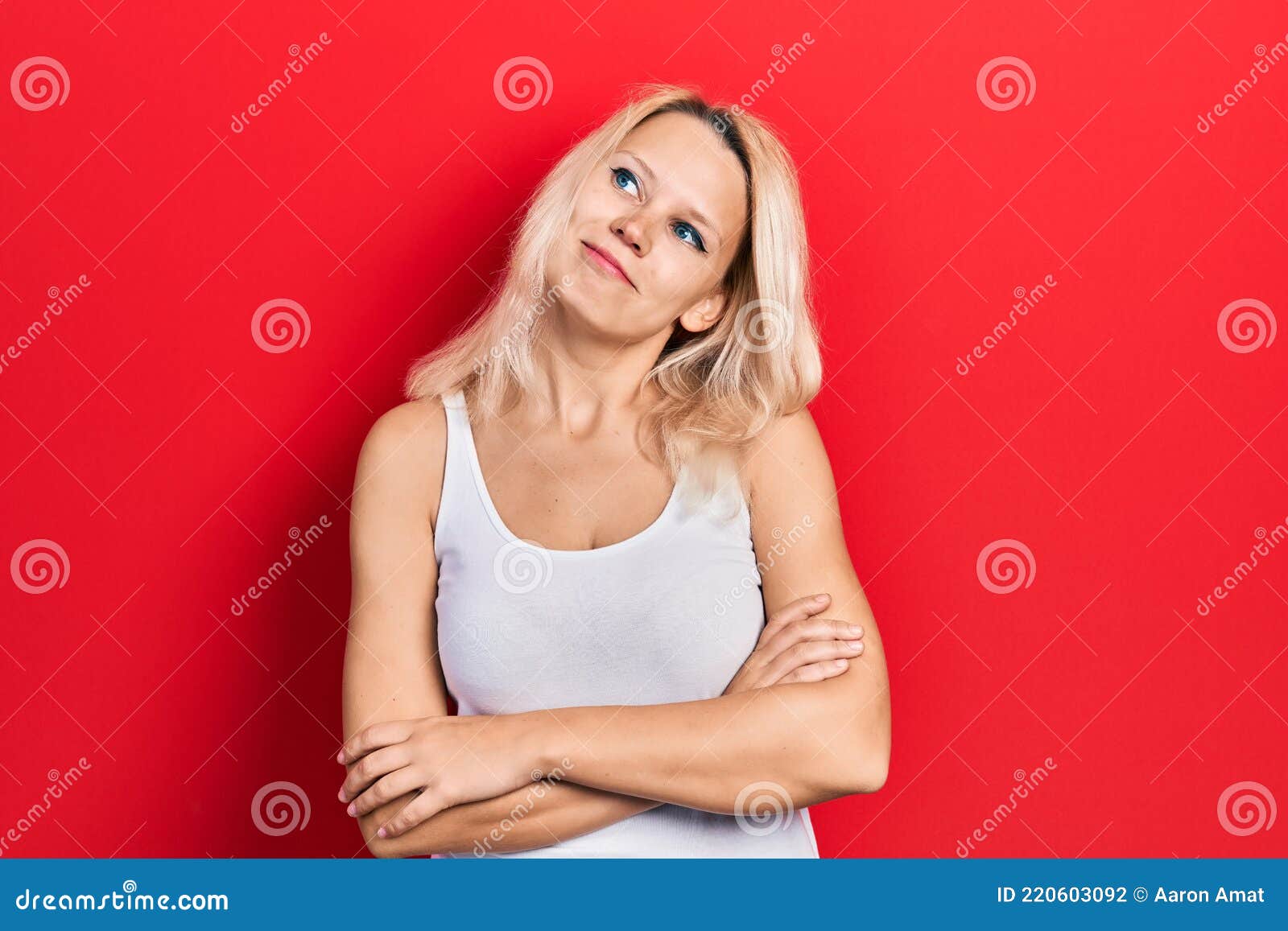 Beautiful Caucasian Blonde Woman Wearing Casual White T Shirt Smiling