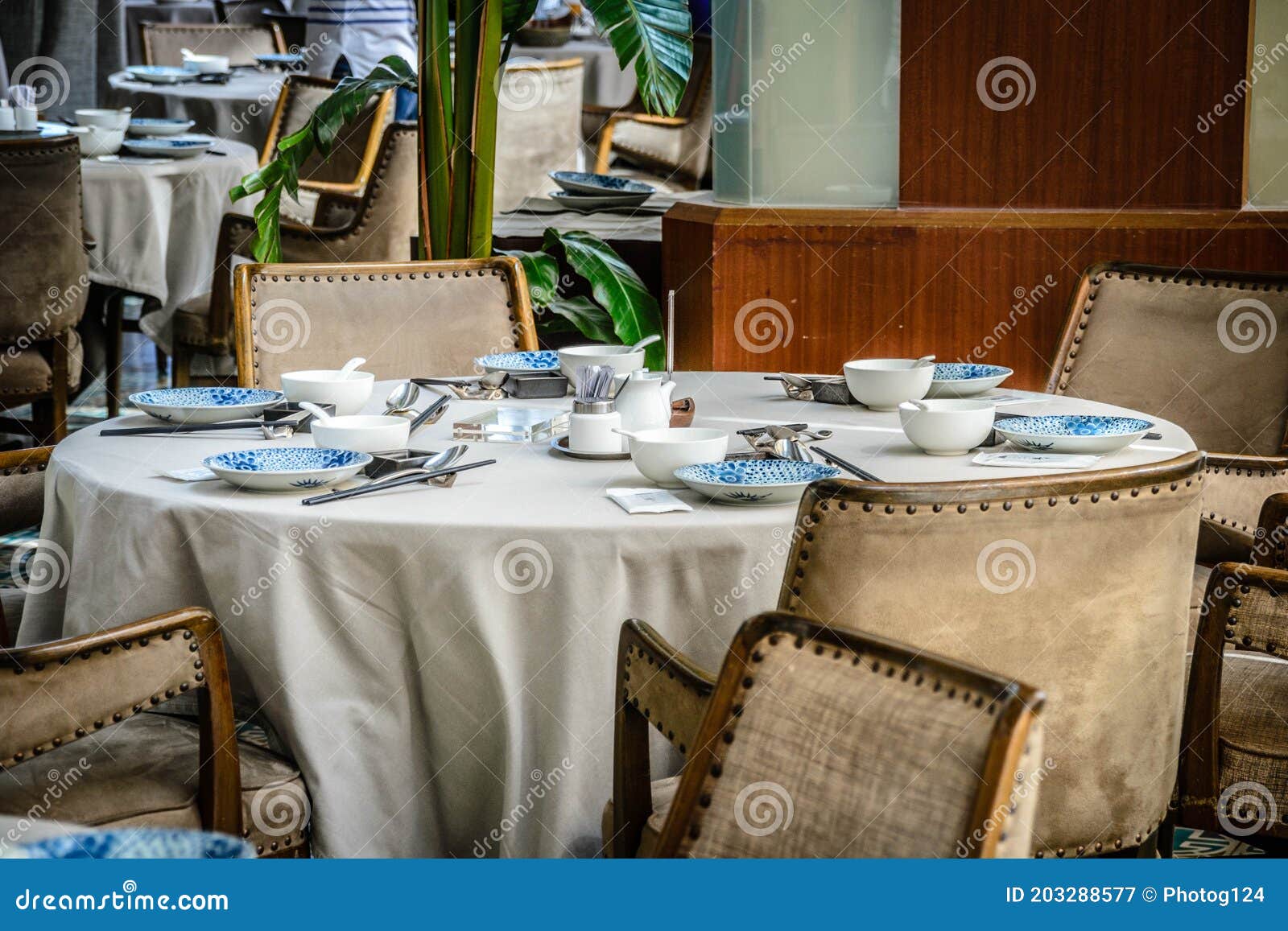 A Beautiful Chinese Restaurant with Beautiful Table Setting and and ...