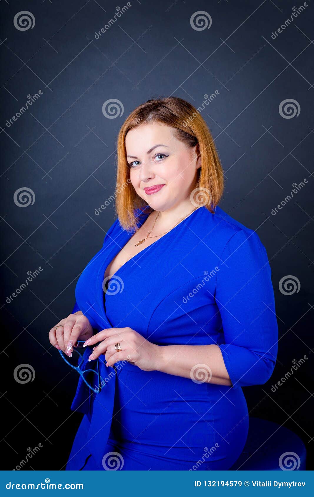 Beautiful Chubby Girl In Blue Elegant Dress On A Black Background Stock Image Image Of Hair