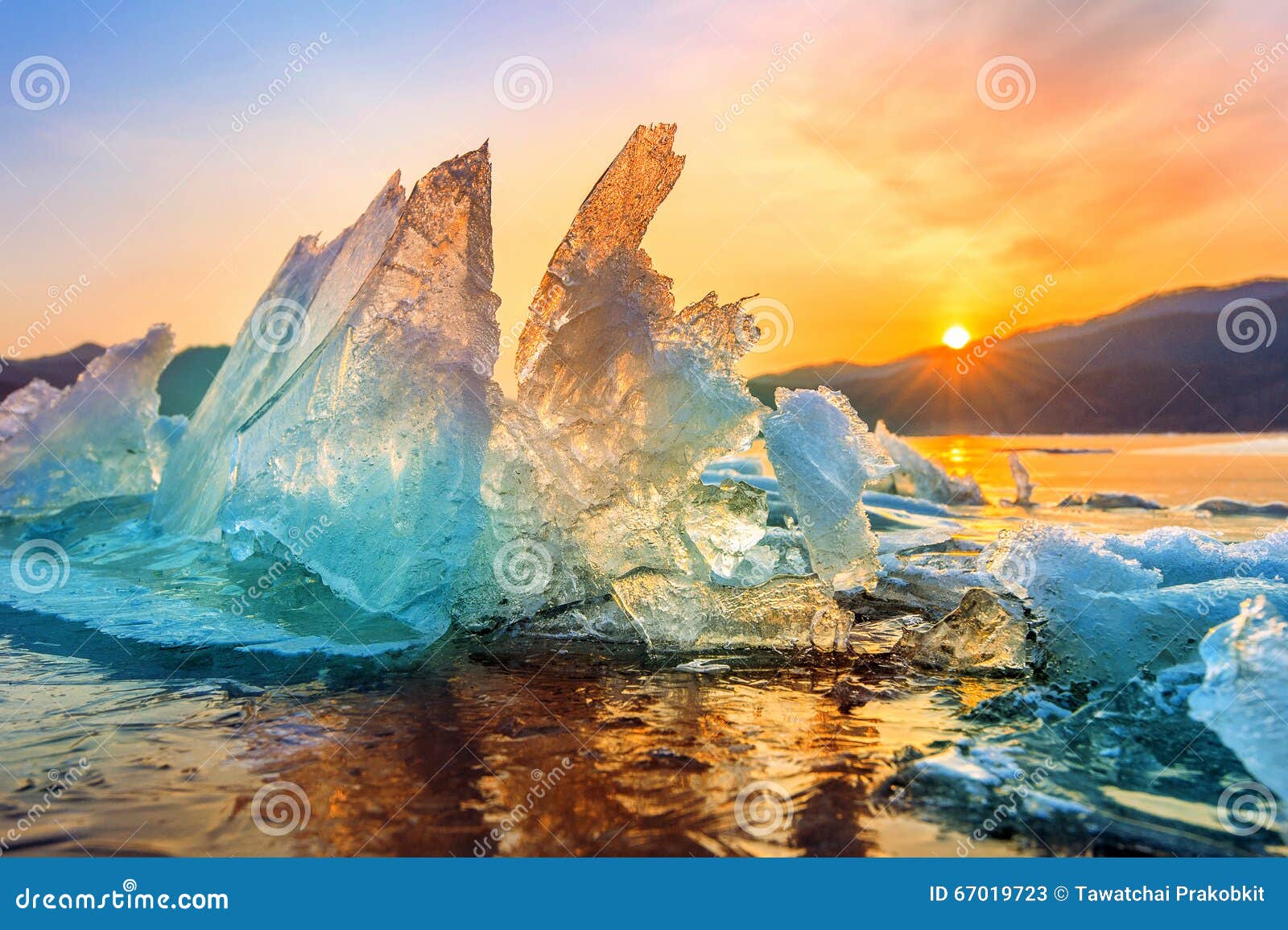 Beautiful Chunk of Ice at Sunrise in Winter. Stock Image - Image of ...
