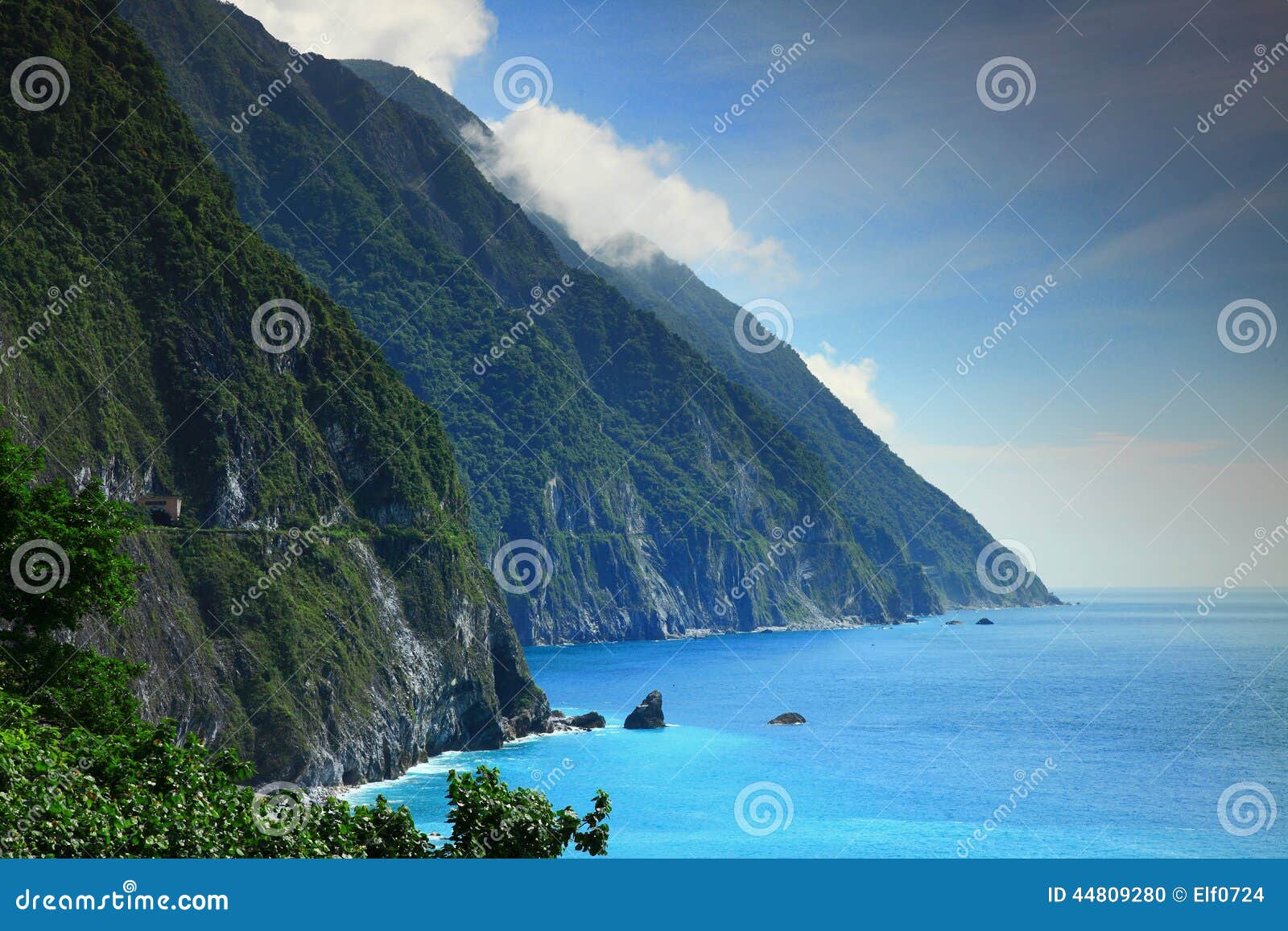 Beautiful Cliff At The Edge Of A Mountain With The Bali Sea In The ...