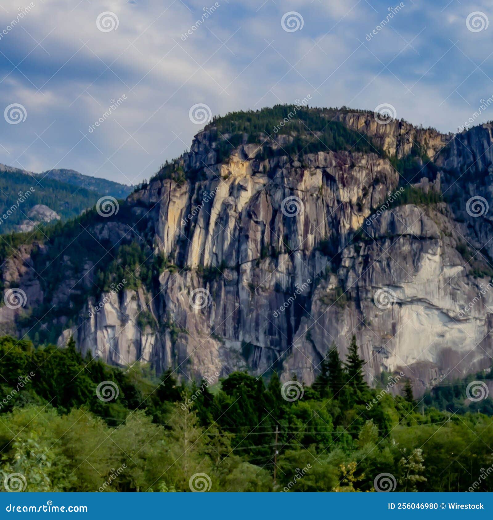 Beautiful Cliff Under a Blue Cloudy Sky Stock Photo - Image of outdoor ...