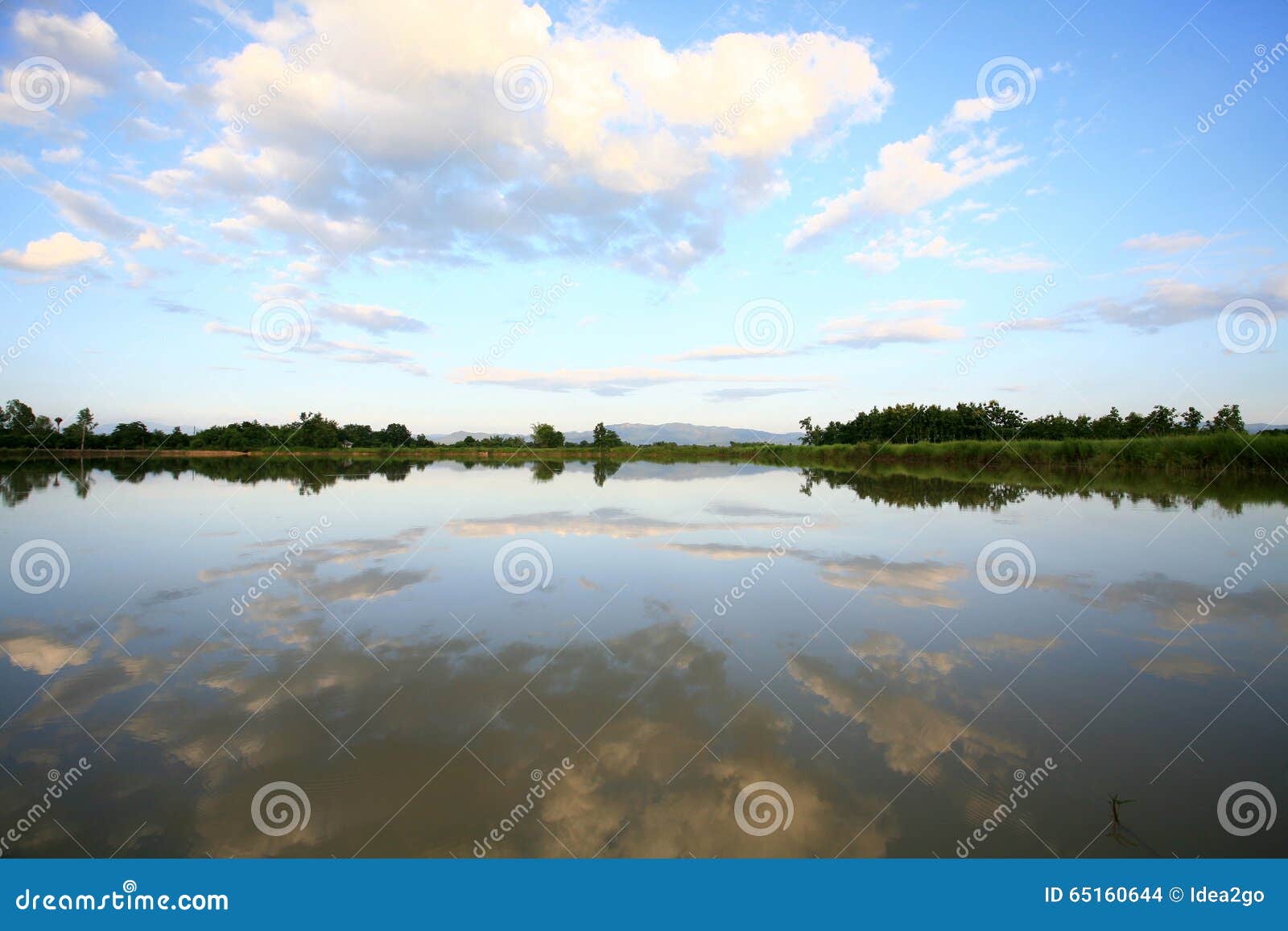 Beautiful Clouds and Blue Sky Reflection on Water Surface Stock Photo ...