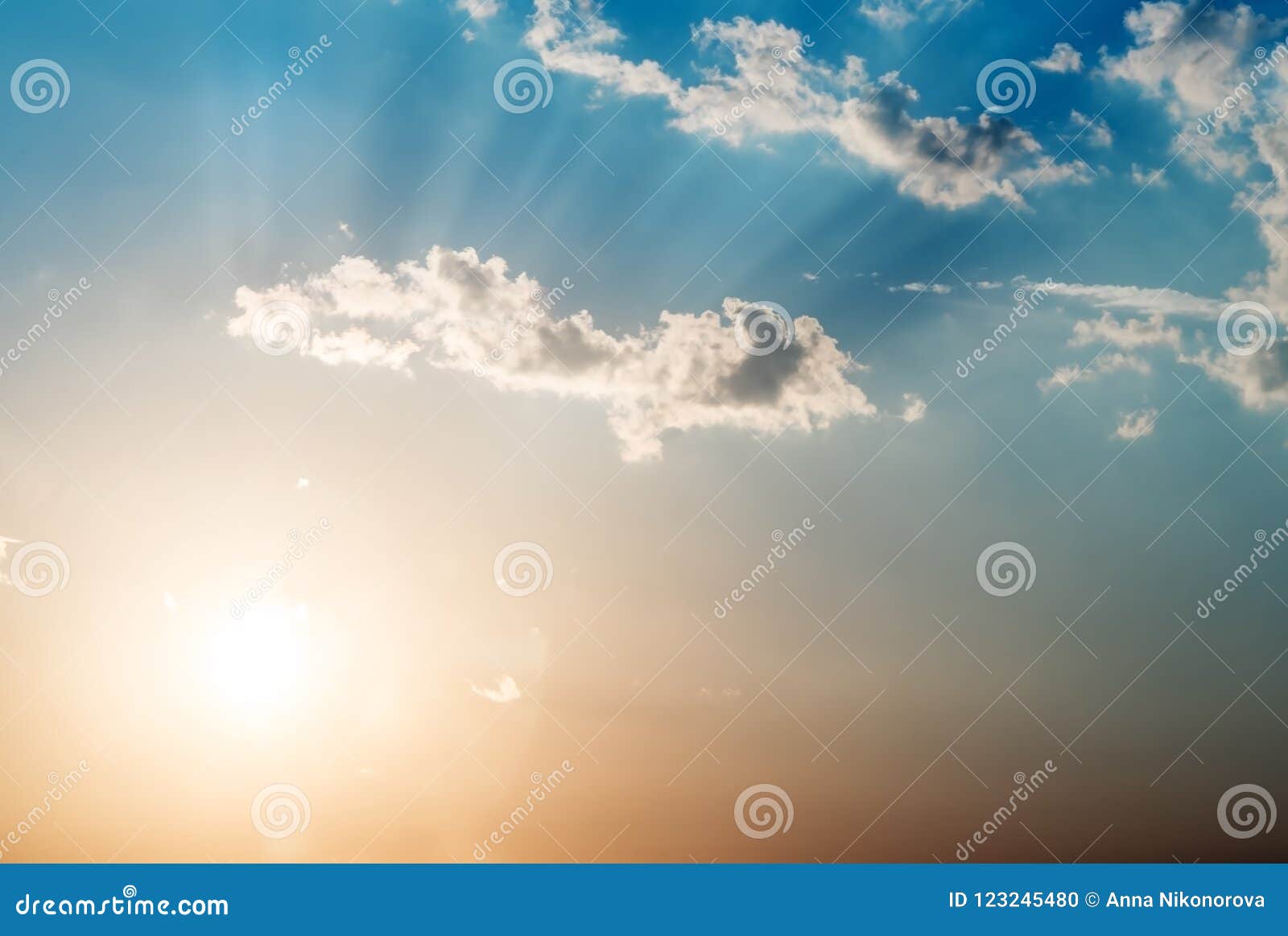 Beautiful Clouds on the Sky and the Sun with Rays Stock Photo - Image ...