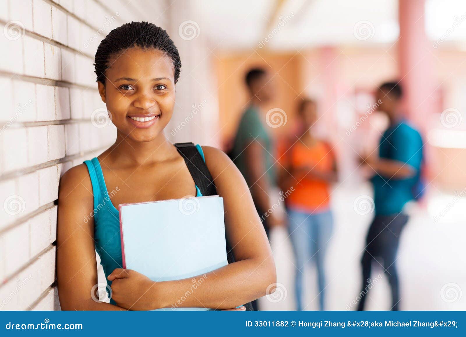 Beautiful college student stock photo. Image of holding - 33011882