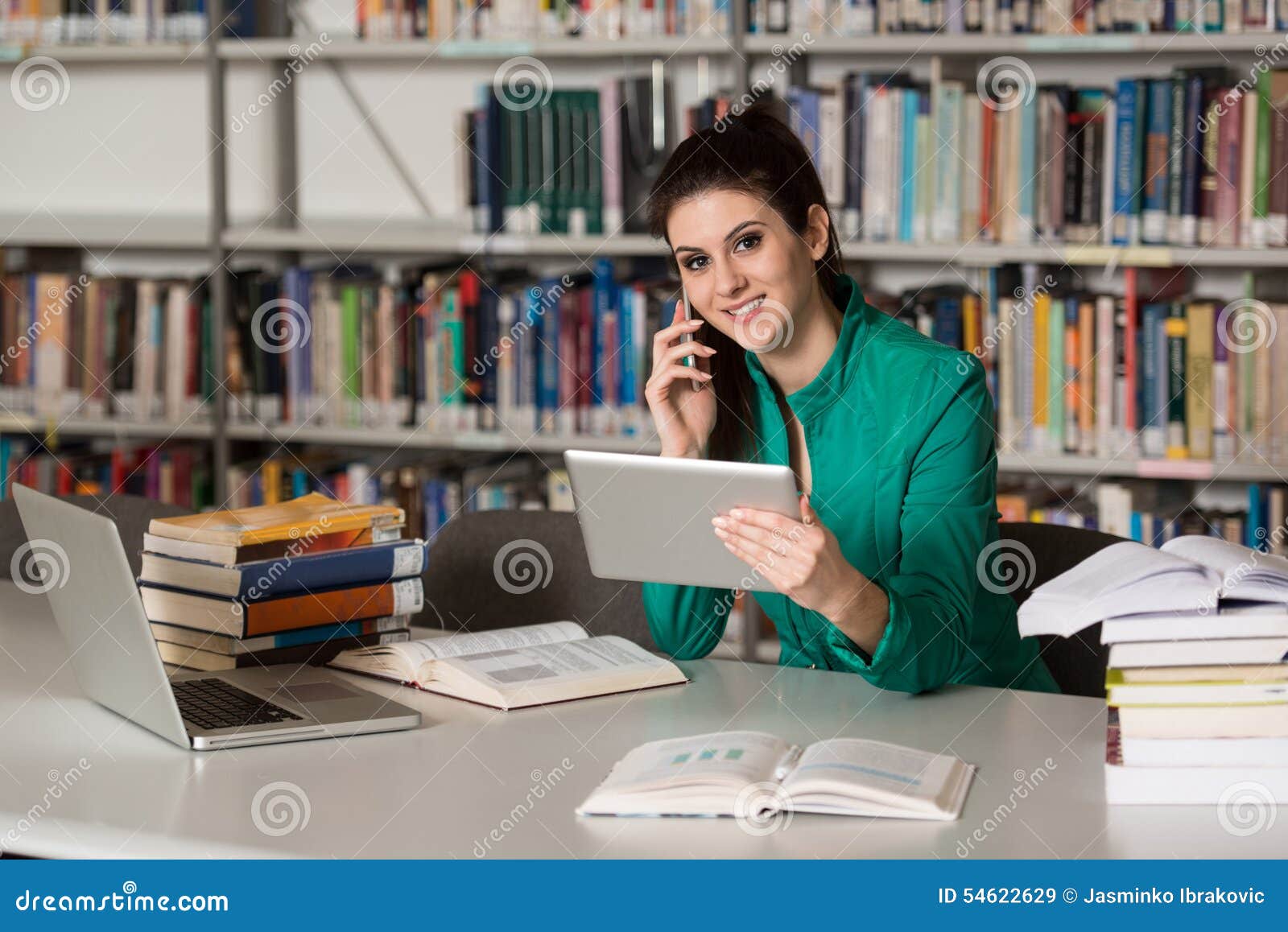Beautiful College Student Using Mobile Phone in Library Stock Image ...