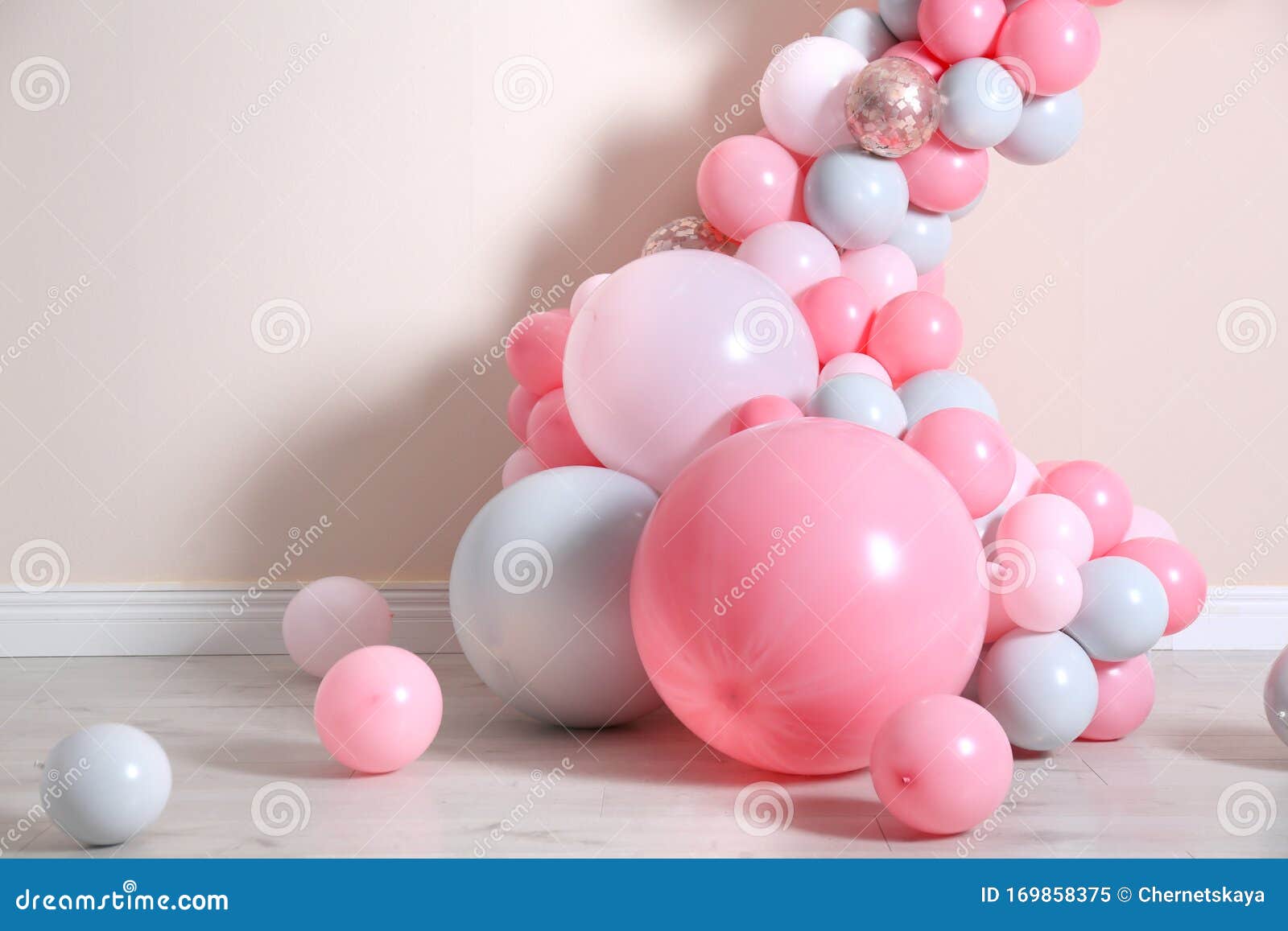 Beautiful Composition with Balloons Near Beige Wall Stock Image - Image ...