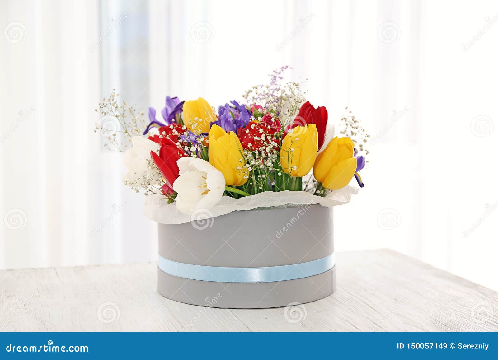 Beautiful Composition with Flowers As Gift on Table Stock Image - Image ...