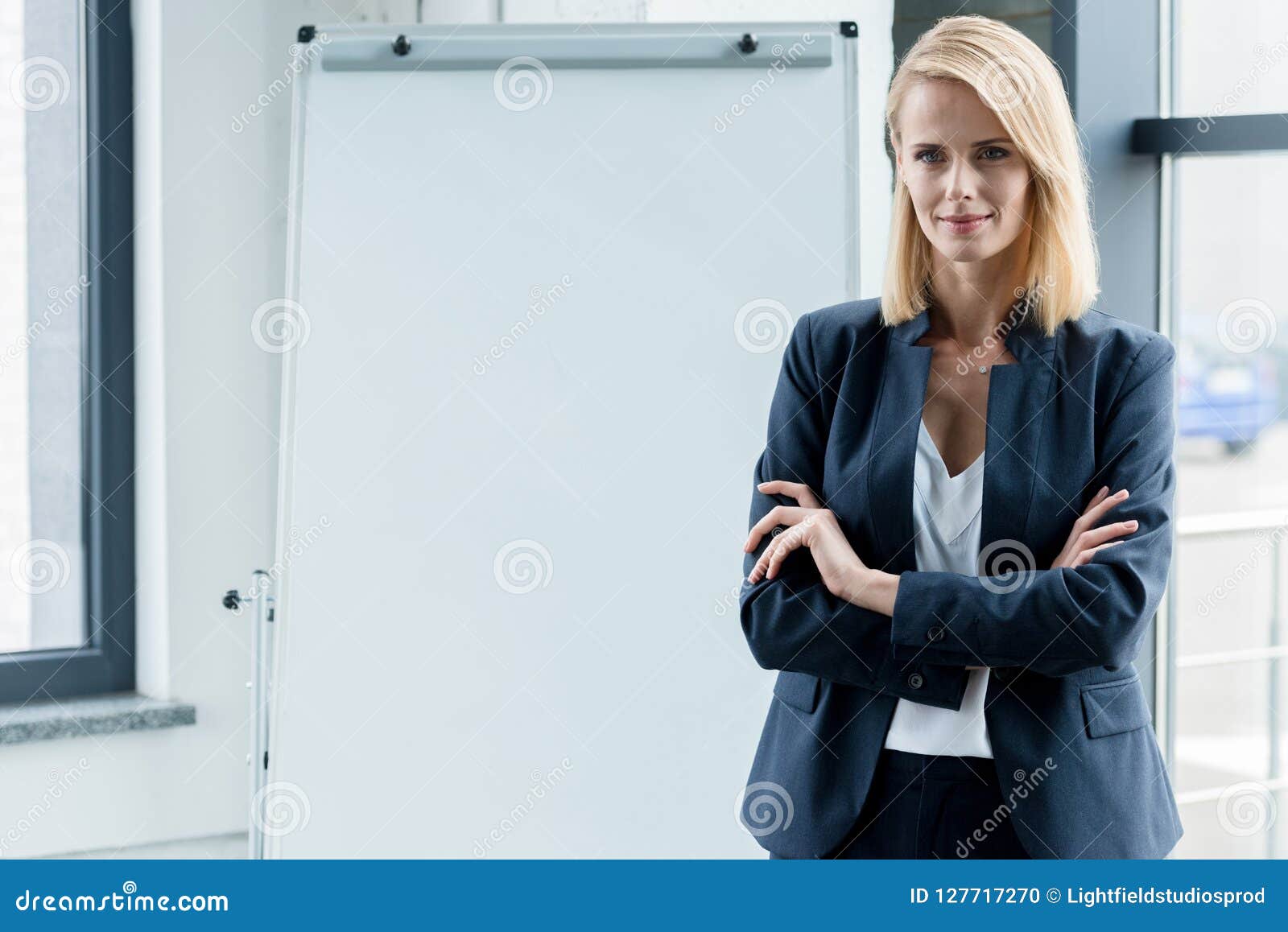 Beautiful Confident Businesswoman Standing with Crossed Arms and ... Beautiful Confident Businesswoman Standing with Crossed Arms and ...