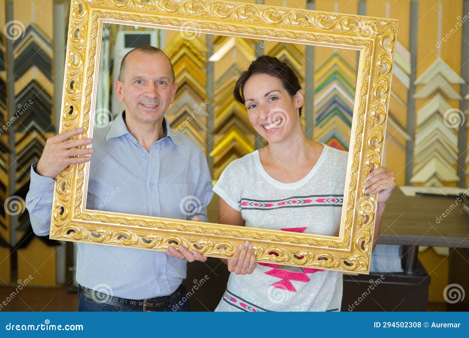 Beautiful Couple Bonding while Looking through Frame Stock Photo ...