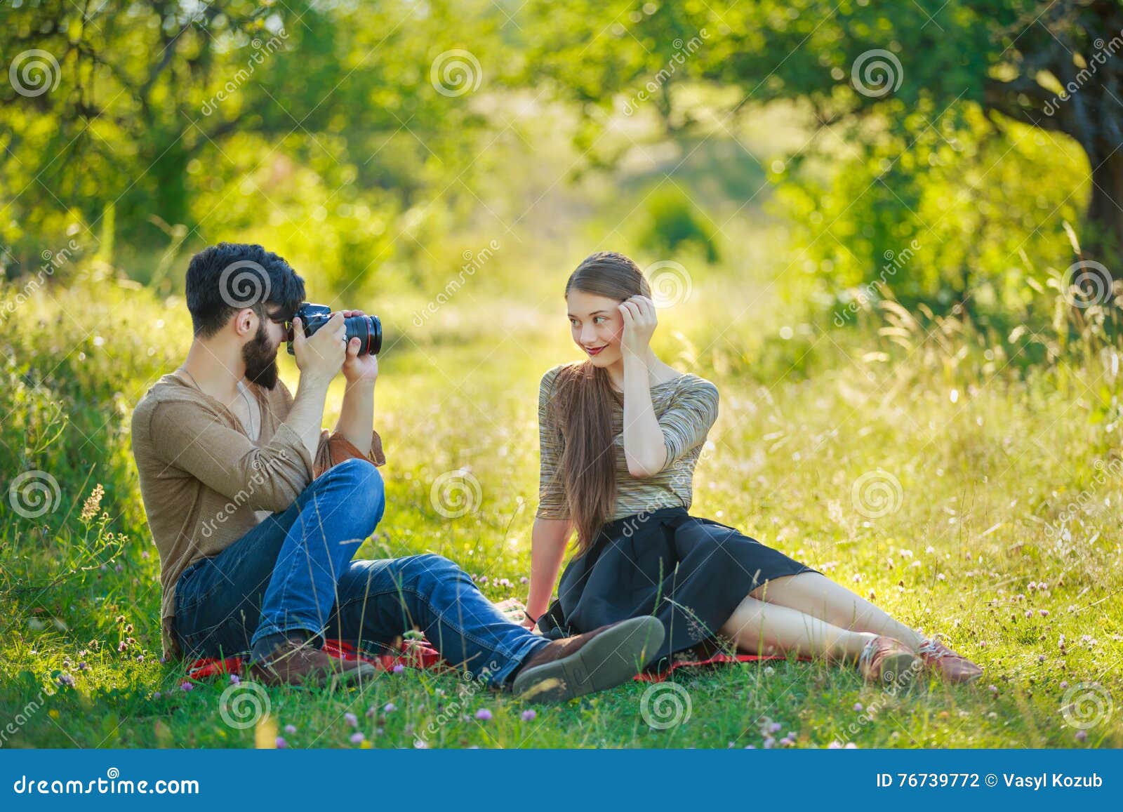 Beautiful Couple with Camera Stock Photo - Image of male, green: 76739772
