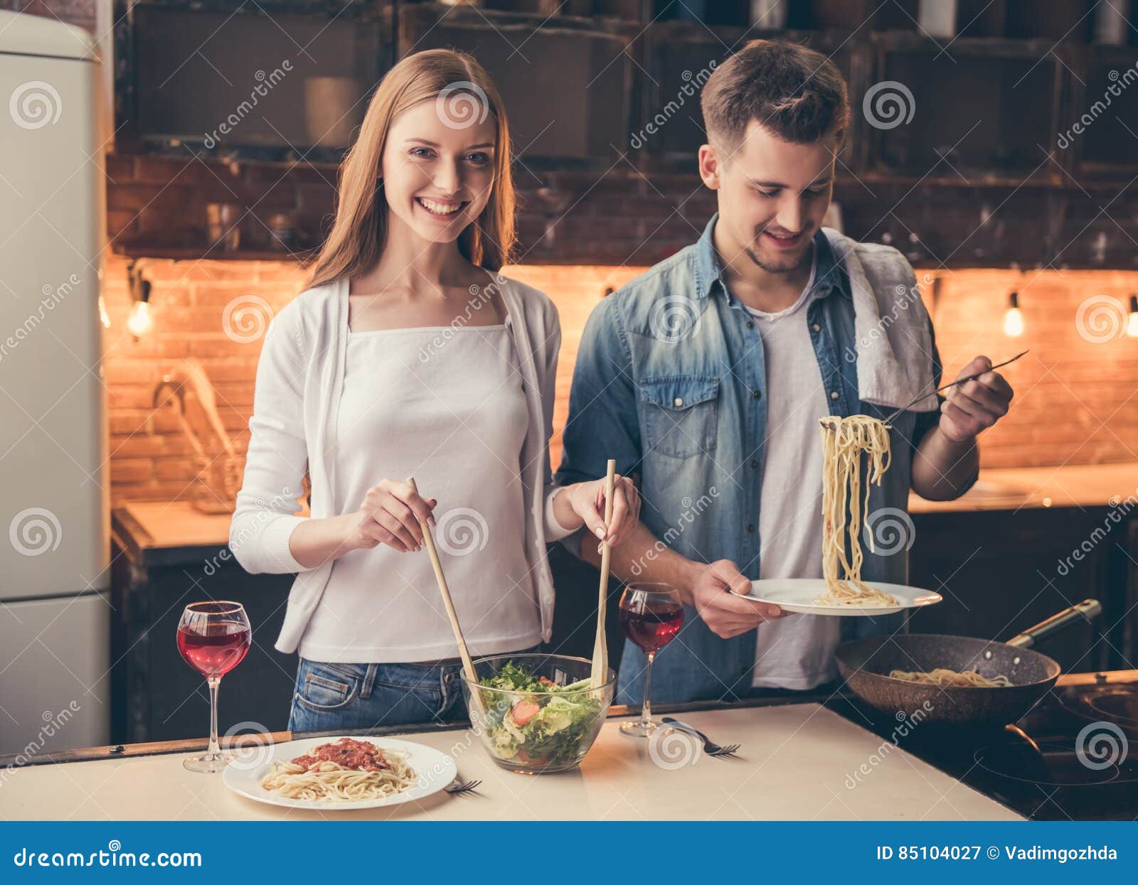 Beautiful couple cooking stock image. Image of adult - 85104027